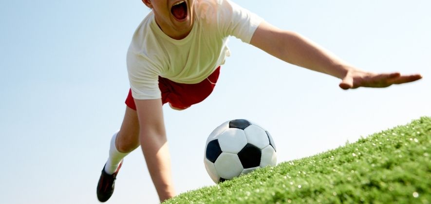 Why Players Grab the Soccer Ball When They Fall (4 Reasons Explained)
