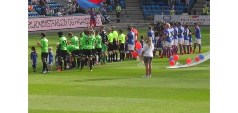 Why Do Soccer Referees Wear Different Colors? (2 Key Reasons)